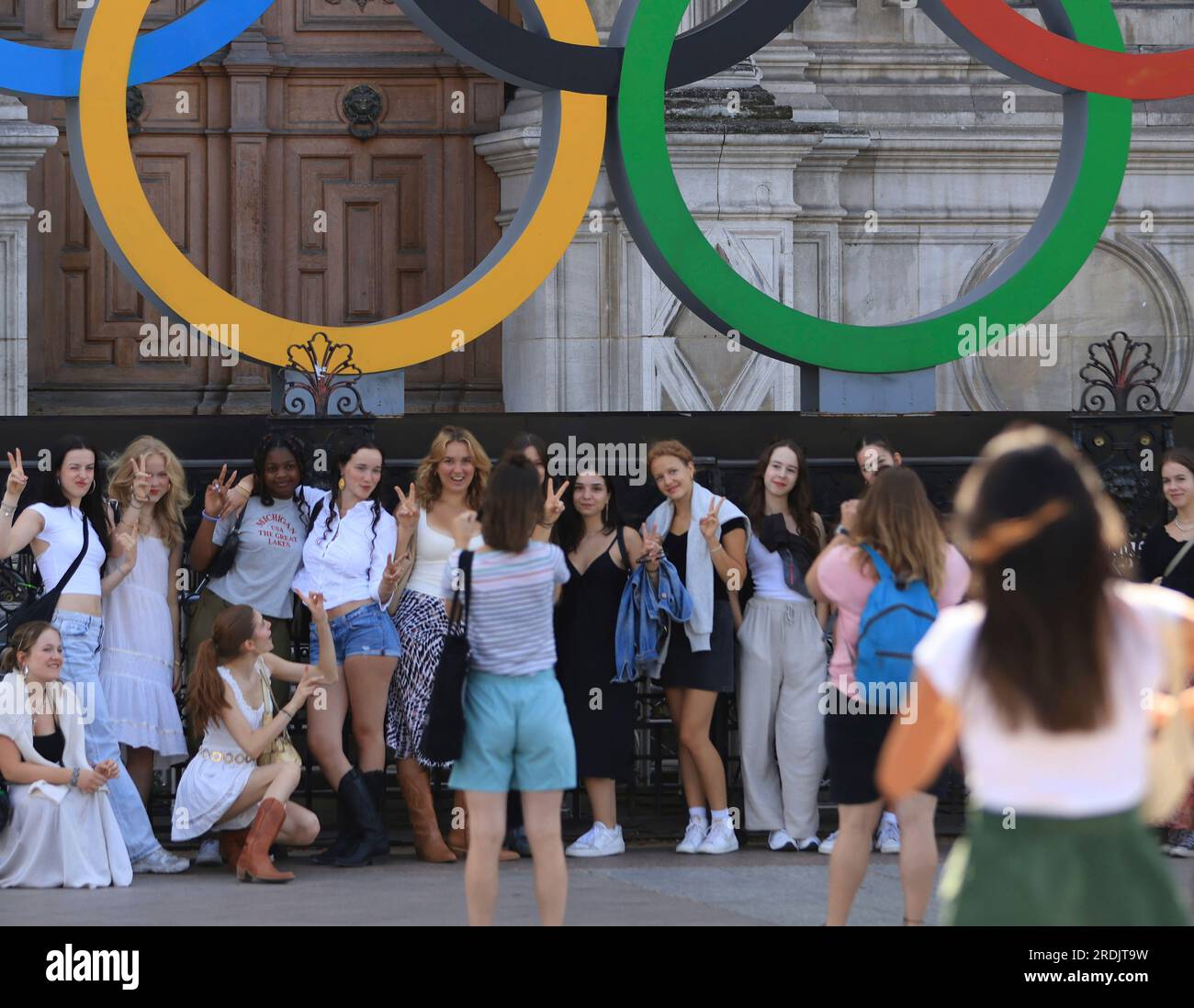 A photo shows the five-ringed Olympic symbol in front of Paris City ...