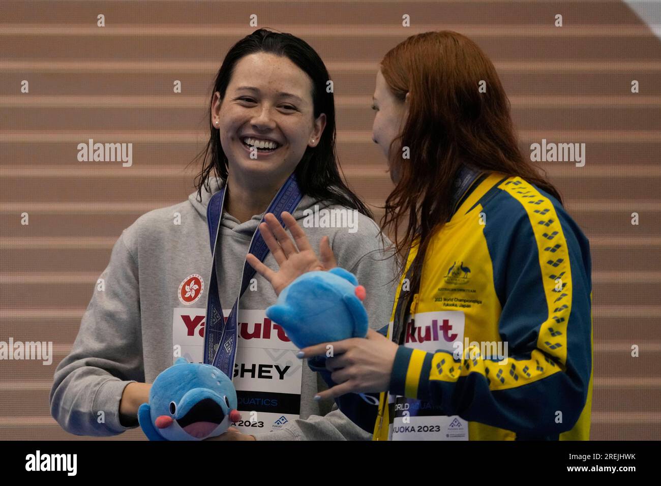 Silver medalist Siobhan Haughey of Hong Kong, left, and gold medalist Mollie O'Callaghan of ...