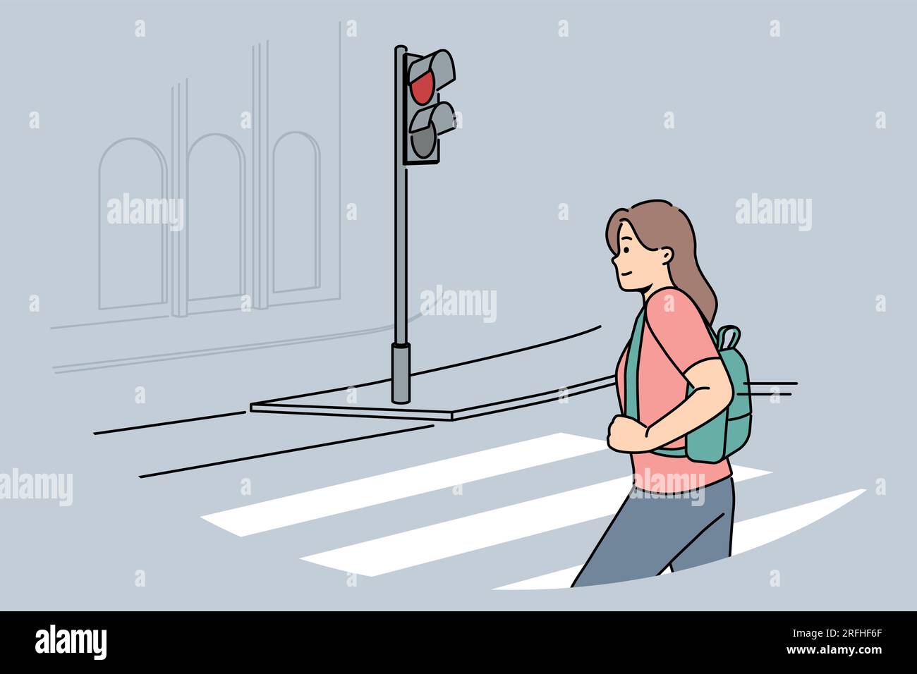 Une femme piétonne traverse la route au feu rouge, mettant en danger la ...