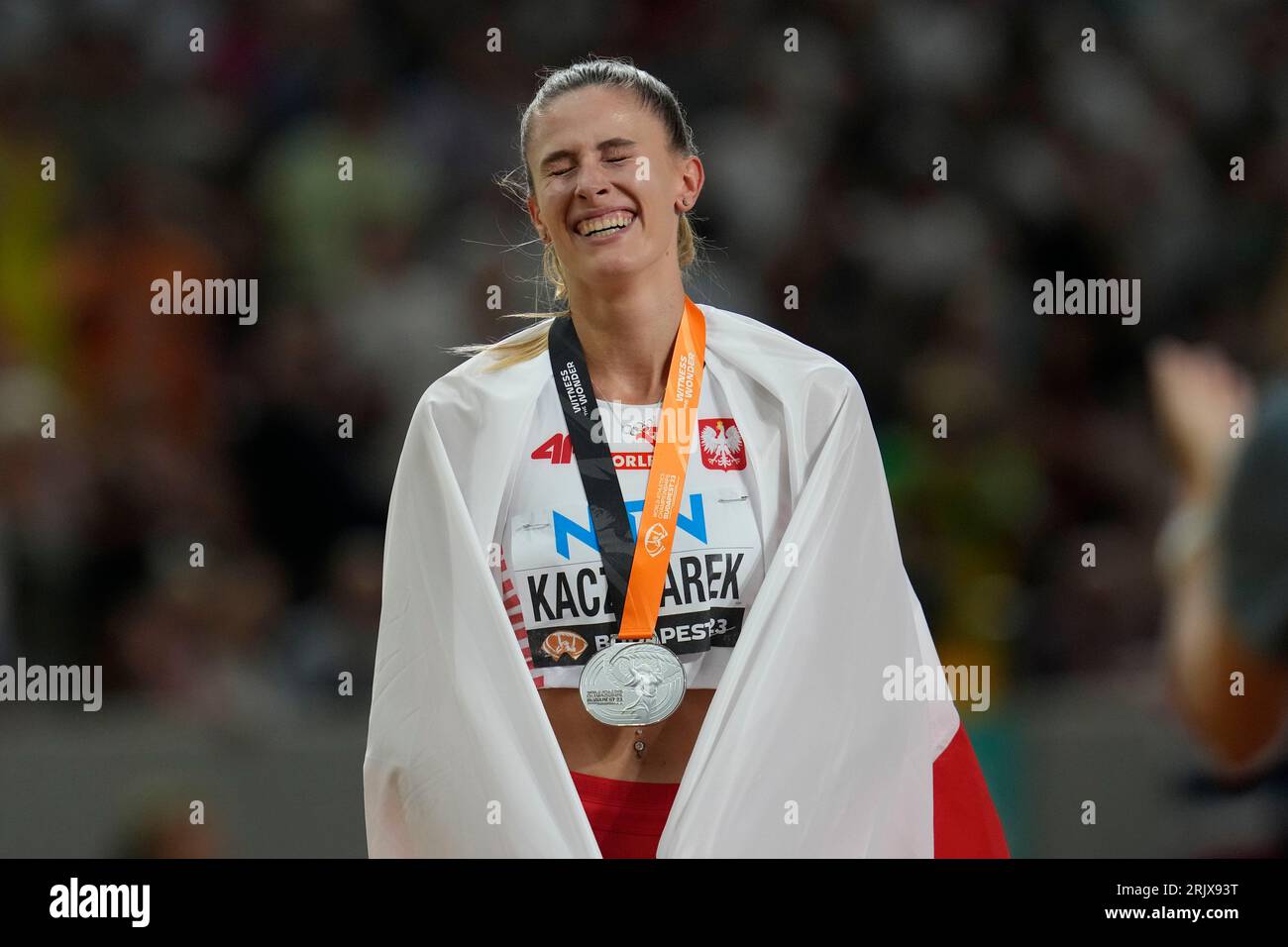 Natalia Kaczmarek, of Poland, reacts after finishing the women's 400 ...