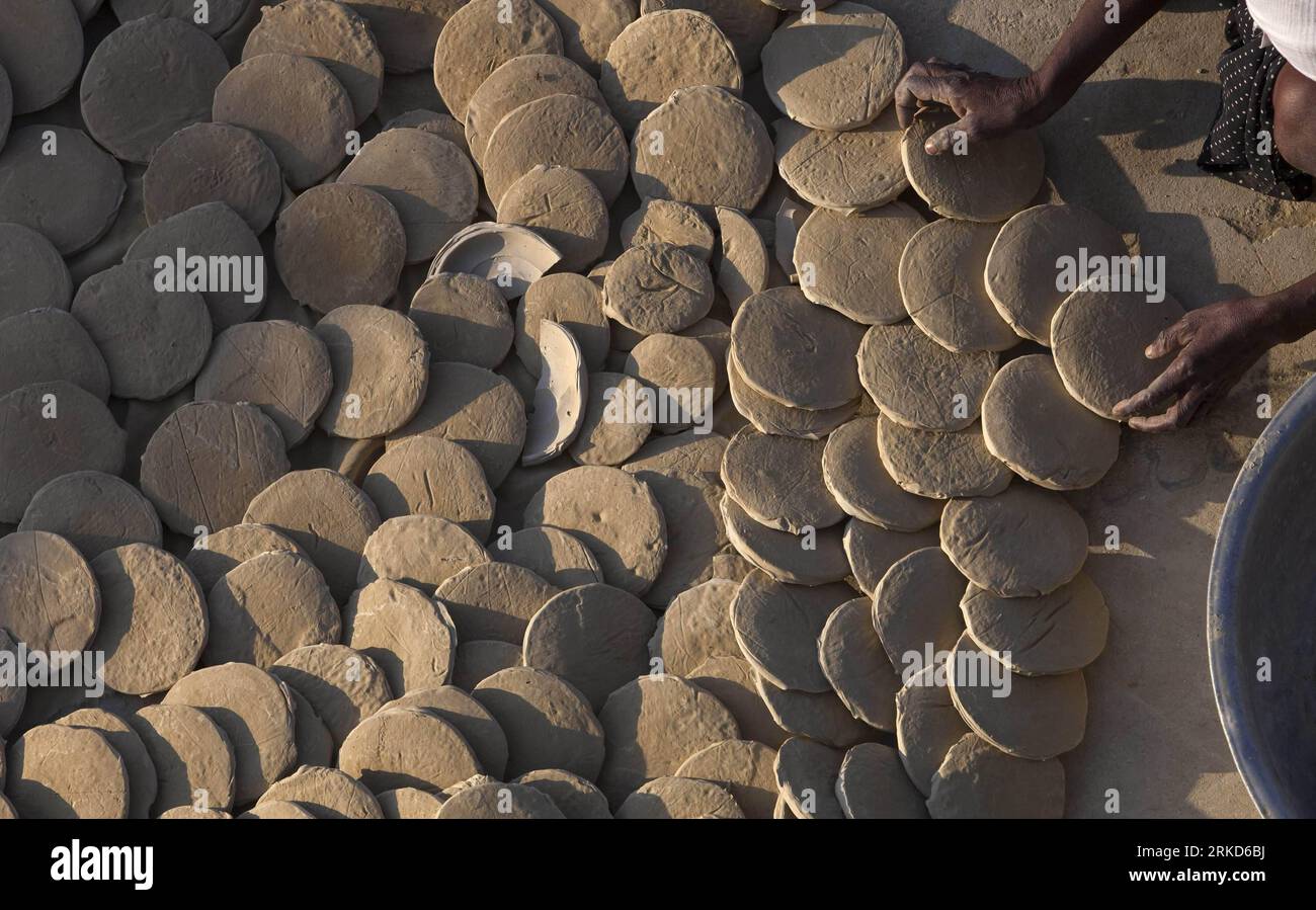 Mud cakes Banque de photographies et d’images à haute résolution - Alamy
