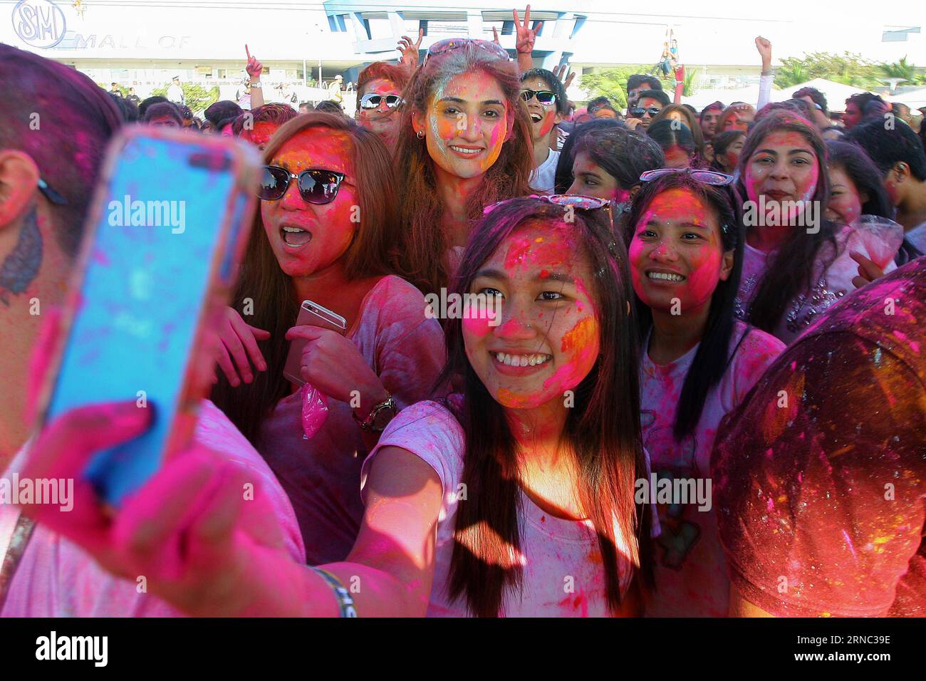 (160320) -- PASAY CITY, March 20, 2016 -- A woman takes a selfie as she ...