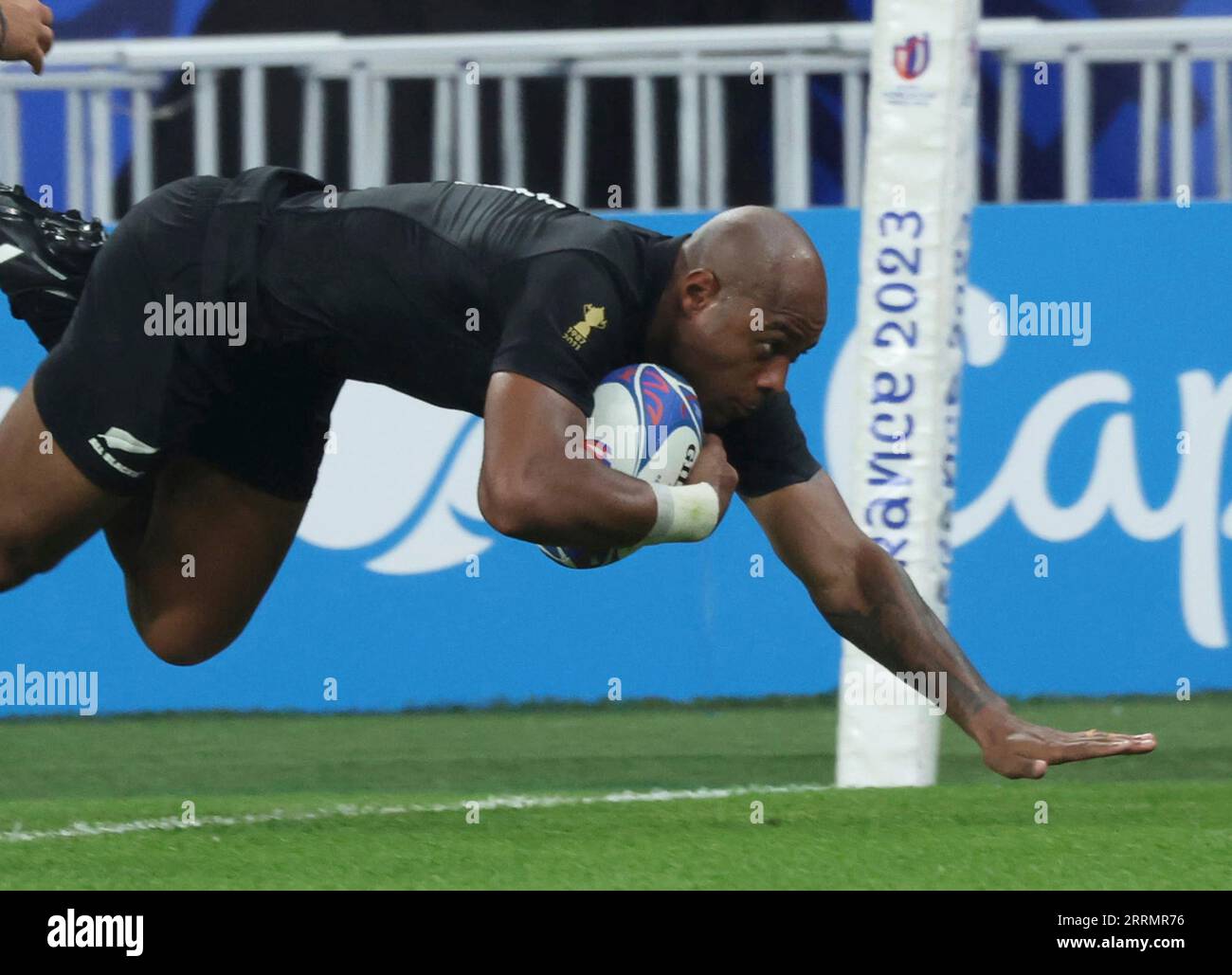 New Zealand's Mark Telea scores his second try during the second half ...