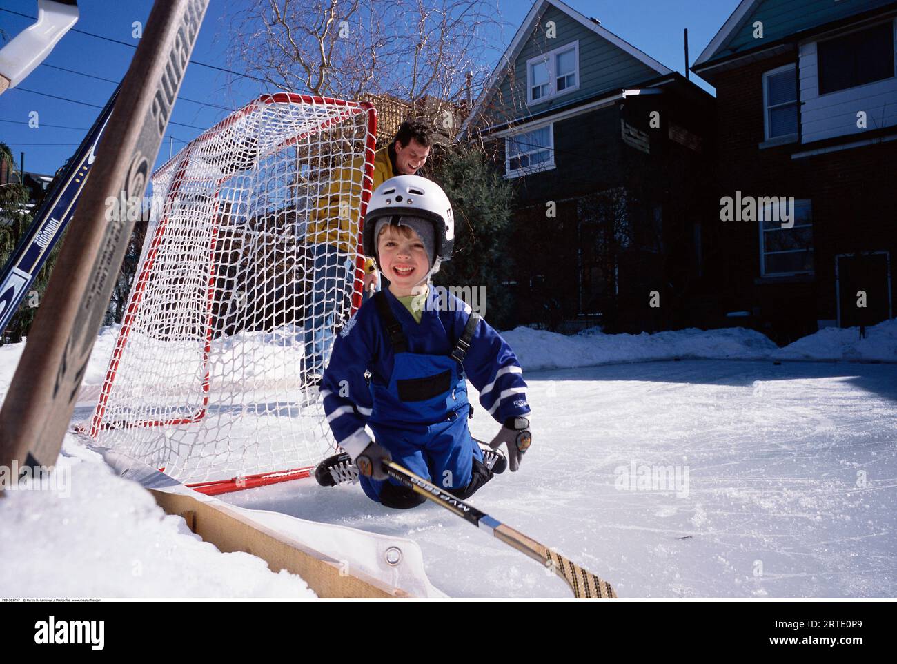 Hockey dans la cour Banque de photographies et d’images à haute ...