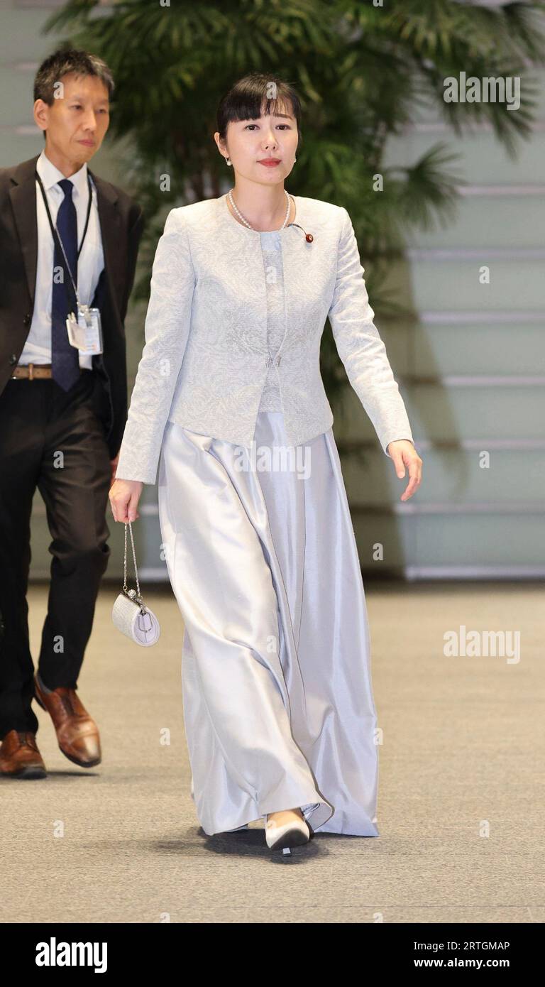 Ayuko Kato returns to the prime minister's office after attending an in ...