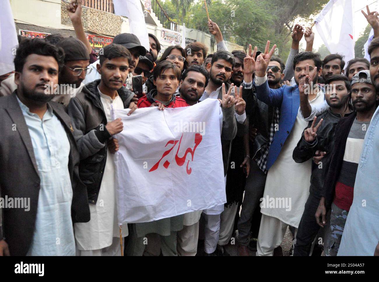 Les membres de la communauté Muhajir organisent un rassemblement à l ...