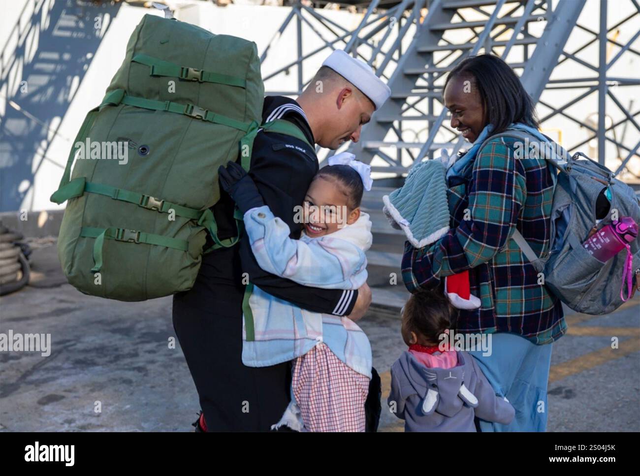 In this photo provided by the U.S. Navy, Hospital Corpsman 1st Class ...