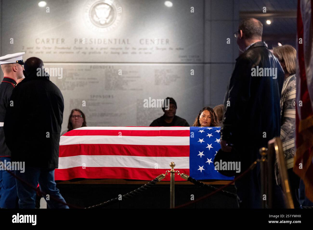 Mourners view the casket of former President Jimmy Carter as he lies in repose at the Jimmy ...