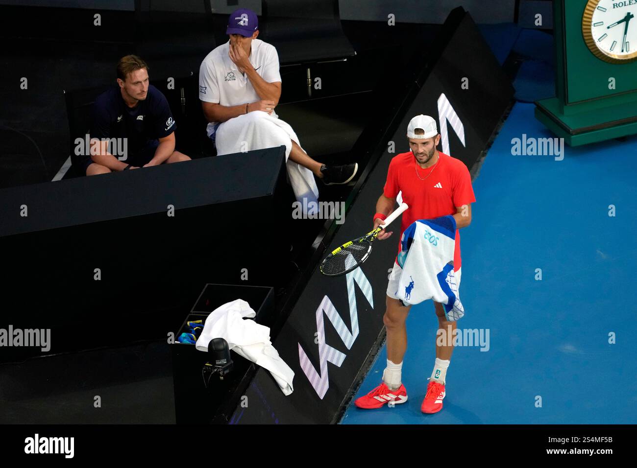 Jacob Fearnley of Britain stands by his coaches box during their first ...