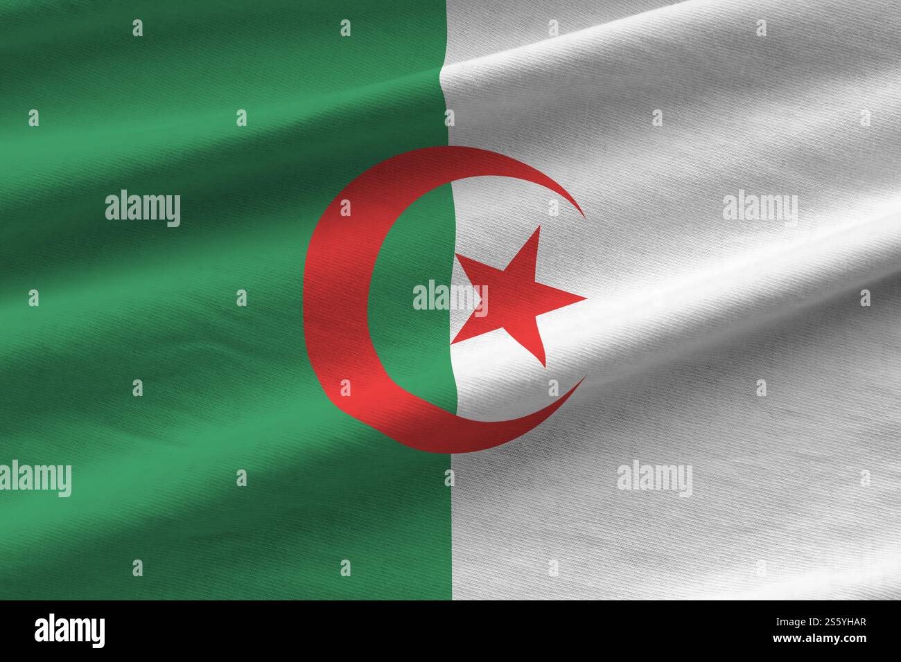 Drapeau algérien avec de grands plis ondulant de près sous la lumière ...