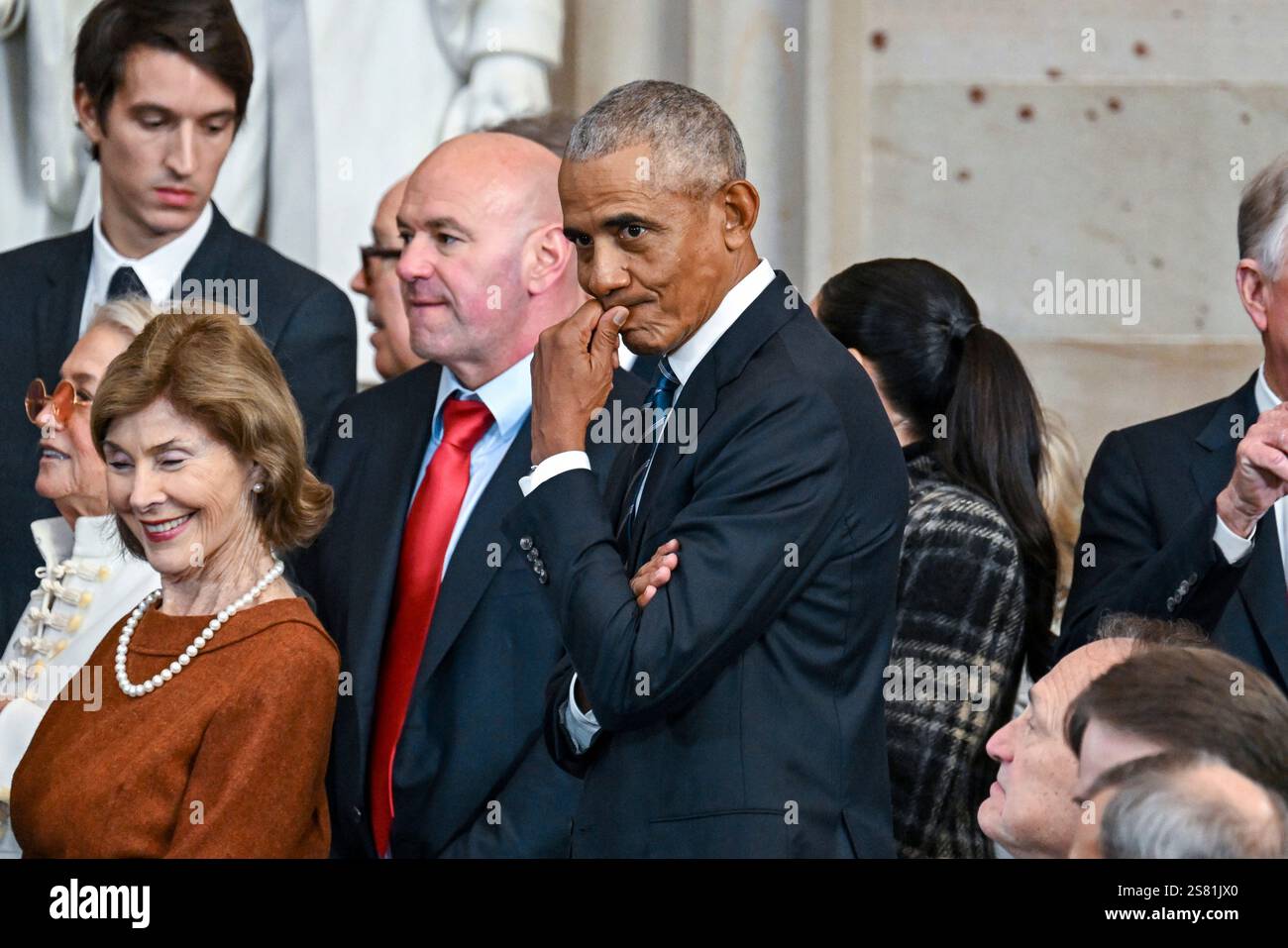 Former President Barack Obama, right, and Laura Bush, left, attend the ...