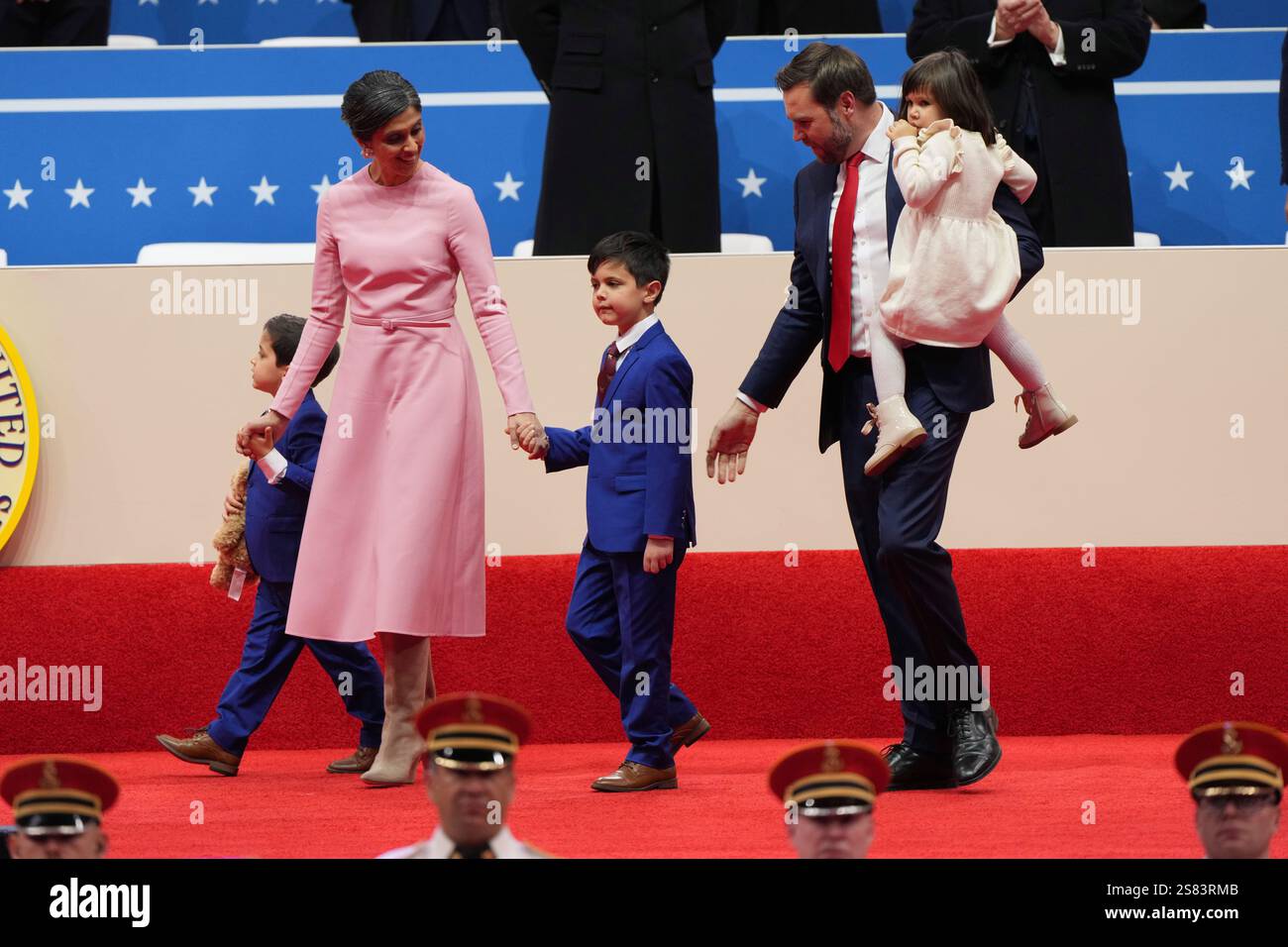 Vice President JD Vance, second right, his wife Usha Vance, second left ...