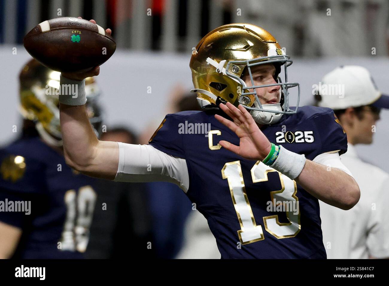 Notre Dame quarterback Riley Leonard warms up before the College ...