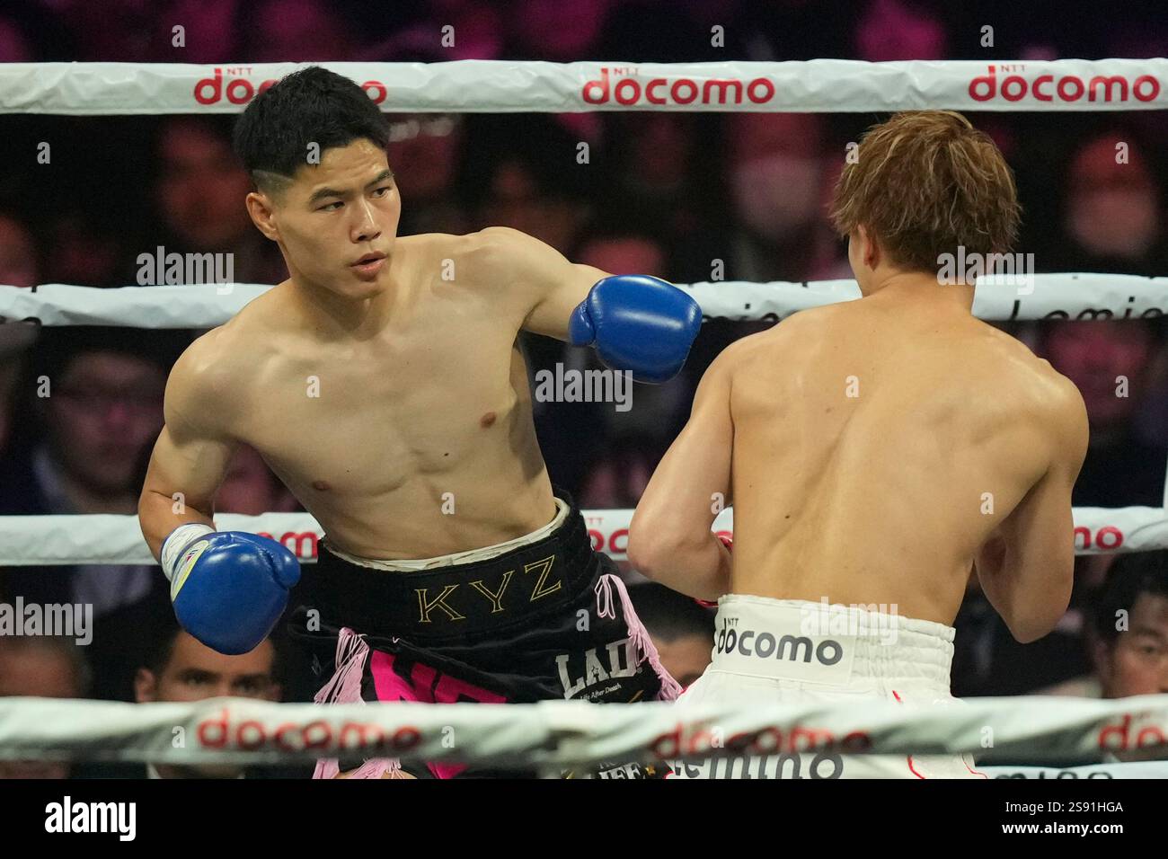 South Korea's Ye Joon Kim, left, and Japanese champion Naoya Inoue compete for the unified WBC ...