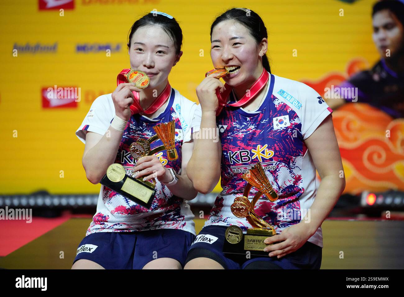 South Korea's Kim Hye Jeong, left, and Kong Hee Yong celebrate on the podium with their medals ...