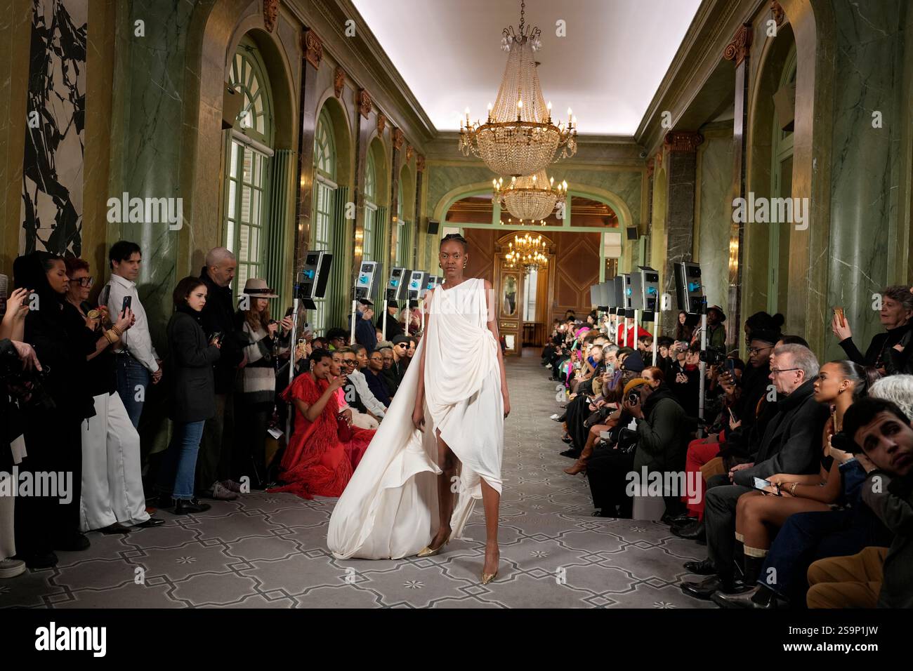 A model wears a creation as part of the Imane Ayissi Haute Couture ...