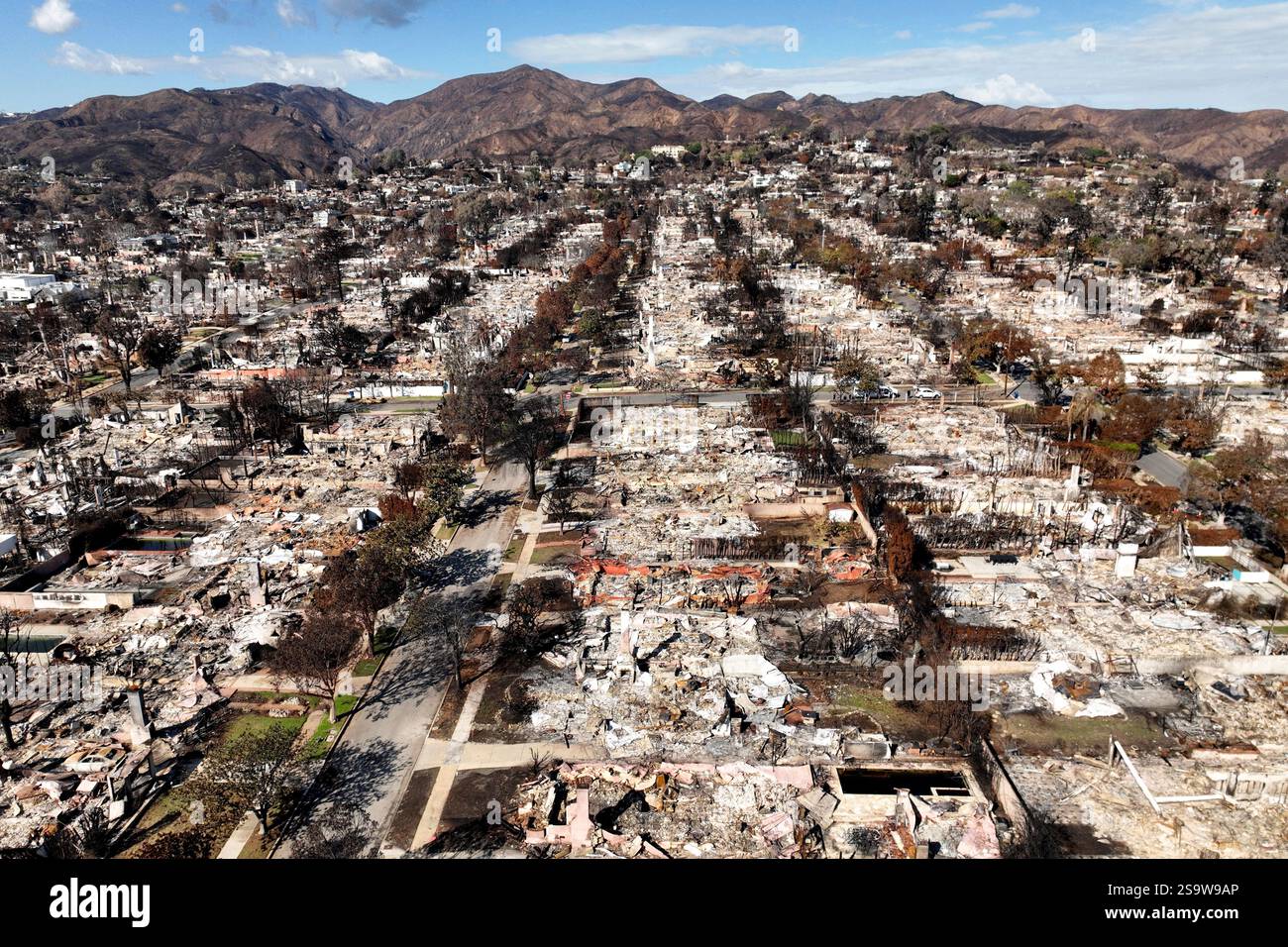 The devastation from the Palisades Fire is shown in an aerial view in ...