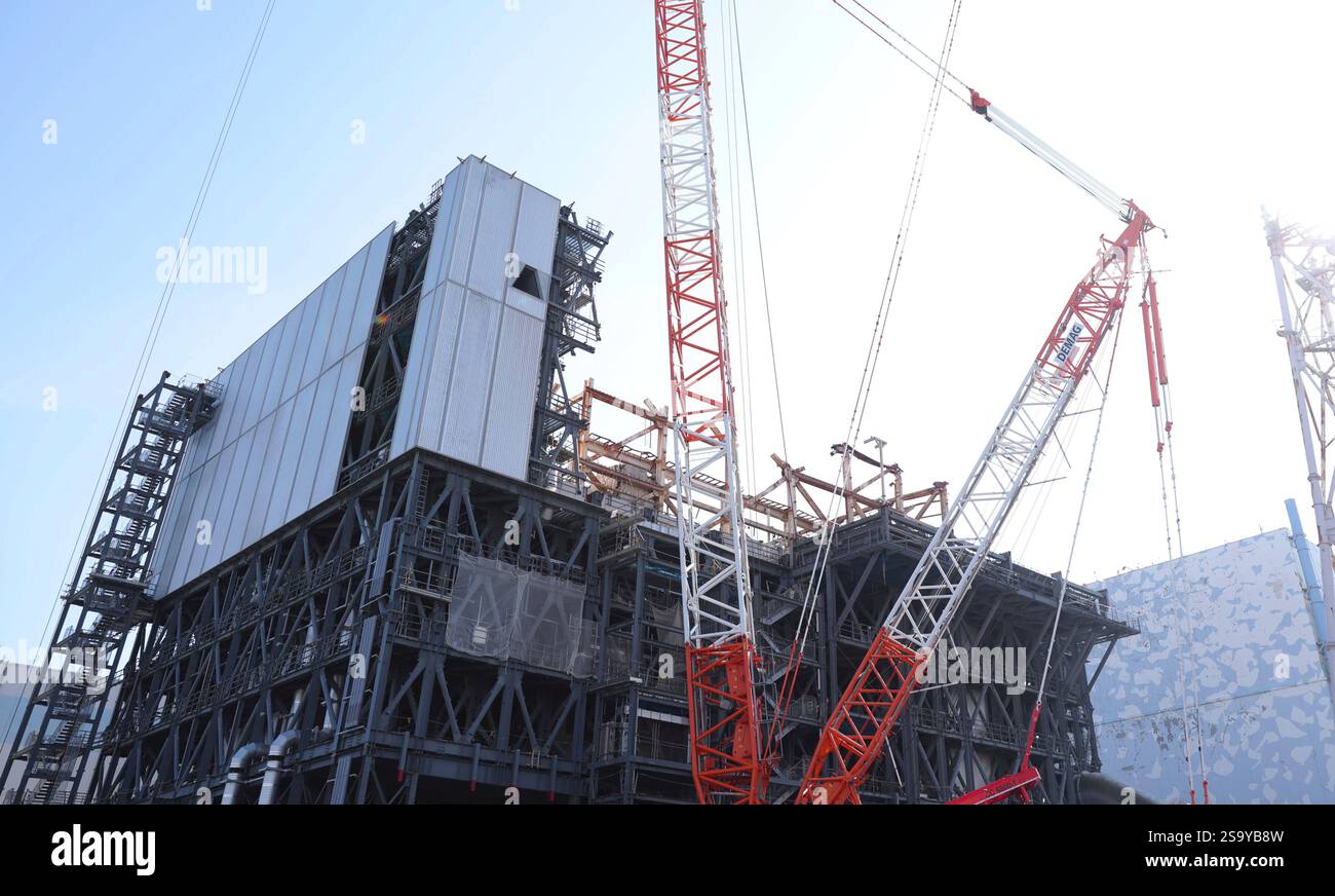 A photo shows the Fukushima Daiichi Nuclear Power Plant Unit 1, where a ...