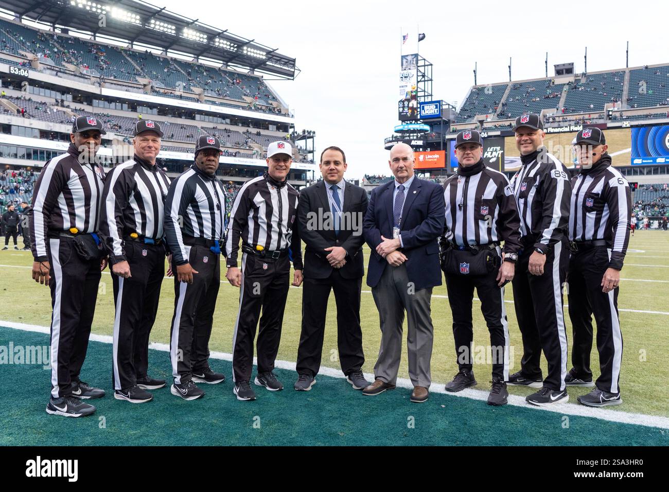 NFL officiating crew (left to right) line judge Julian Mapp (10), back ...