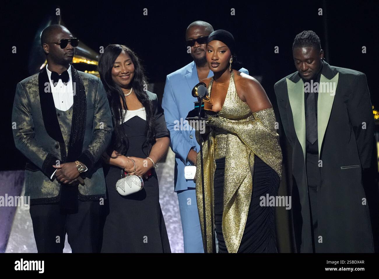 Tems accepts the award for best african music performance for "Love Me ...