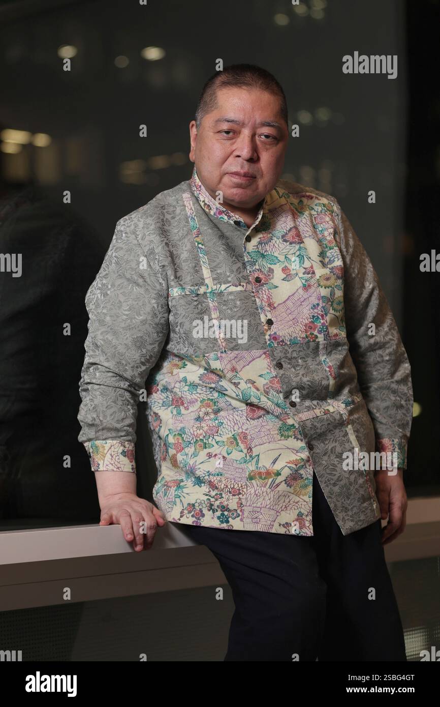 Japanese Author and former Foreign Ministry official Masaru Sato poses for photo during an ...
