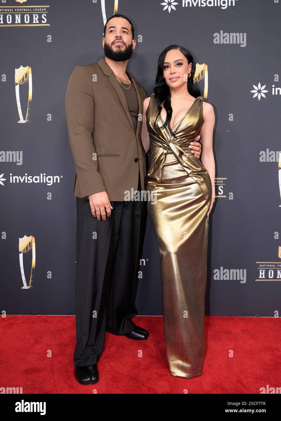 Chef Desmond Scott and wife Christy Scott pose on the red carpet at the ...