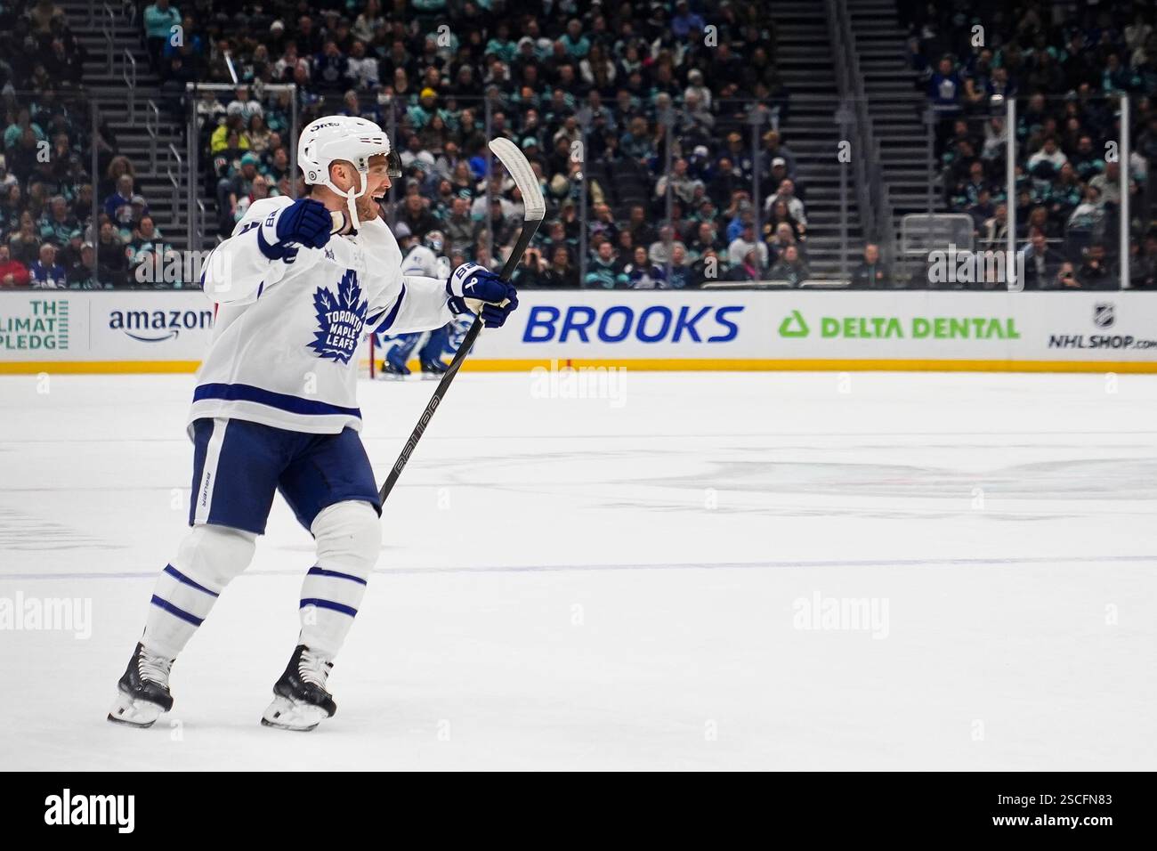 Toronto Maple Leafs center Max Domi celebrates after assisting center ...