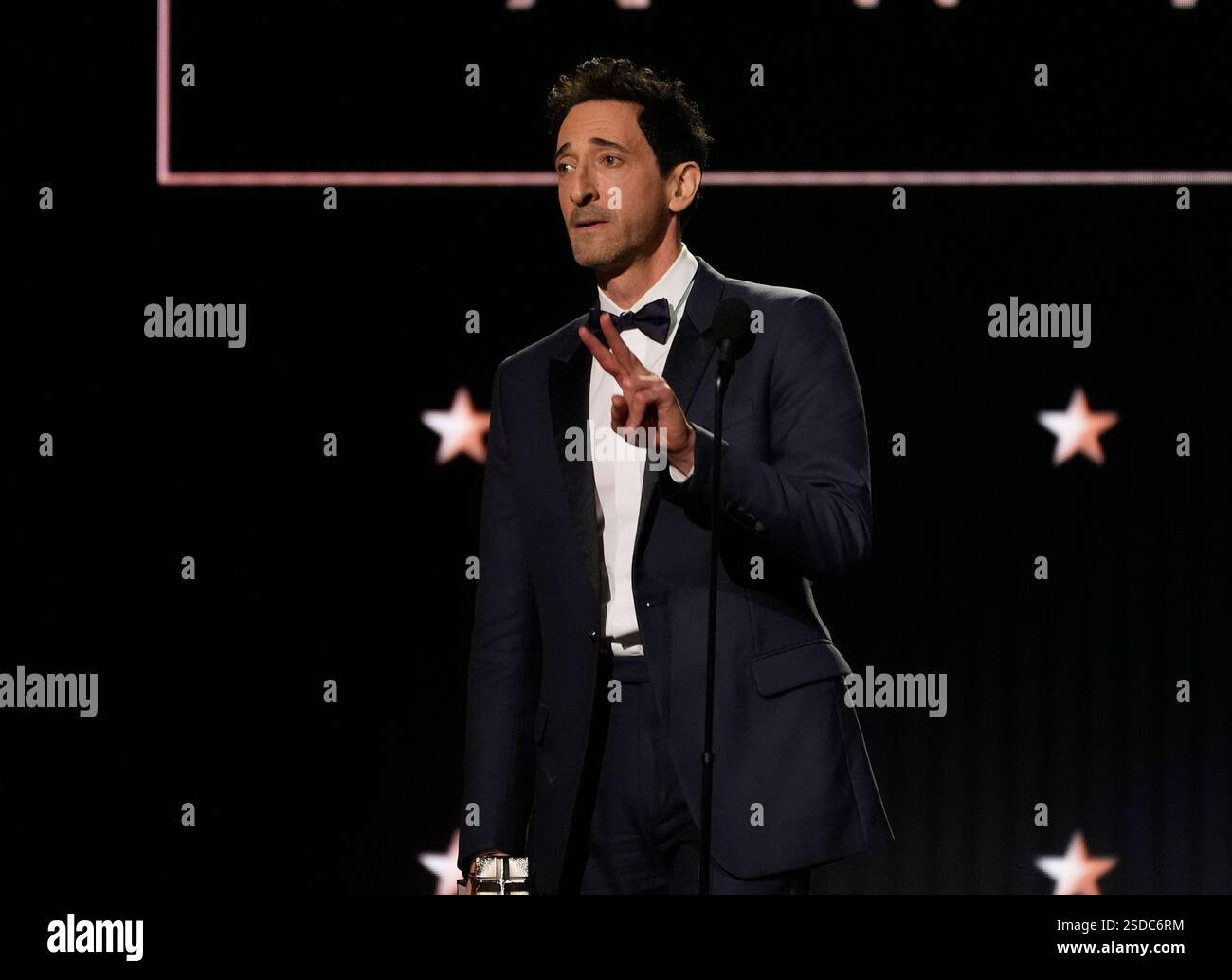 Adrien Brody accepts the award for best actor for "The Brutalist ...