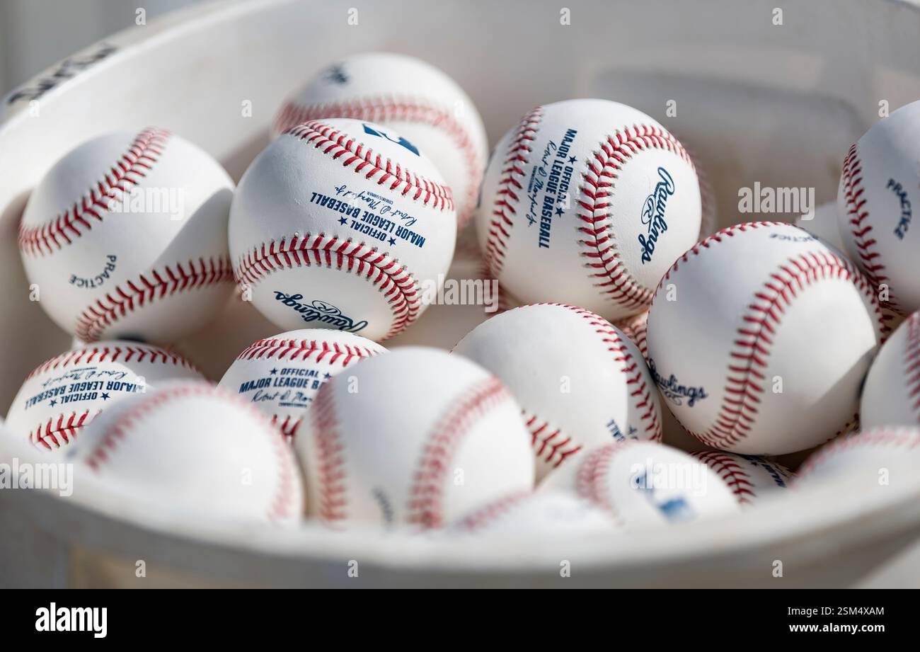 Baseball sit in a bucket as the Miami Marlins host the first day of ...