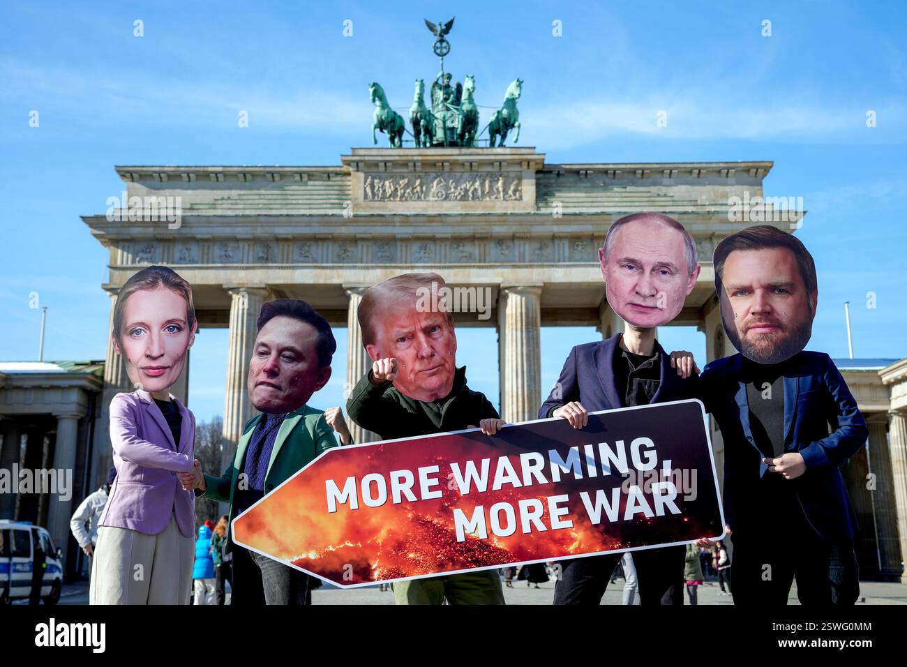 From left, Activists wearing masks of AfD top candidate for Chancellor ...