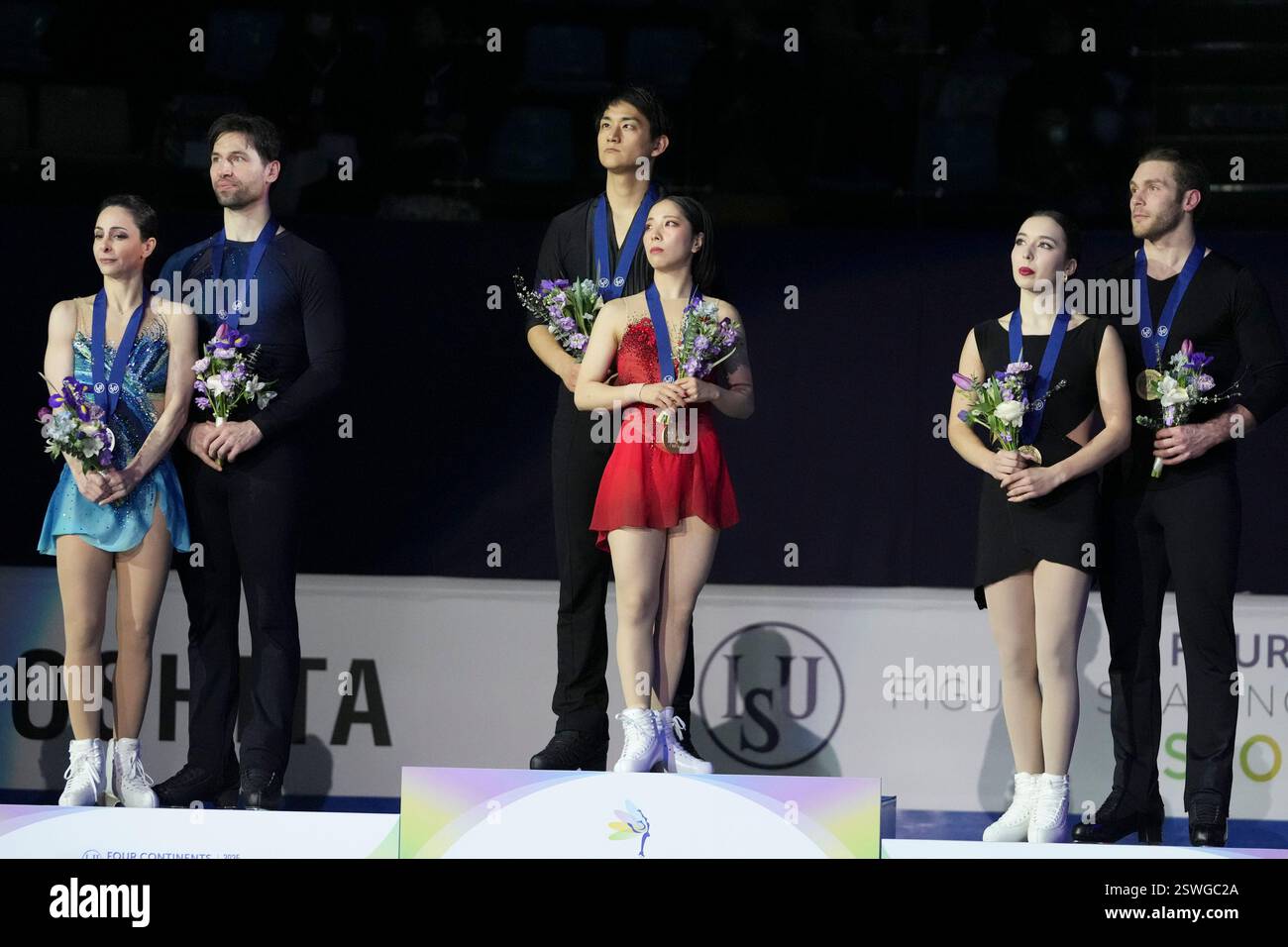 Gold medalists Riku Miura and Ryuichi Kihara of Japan, center, poses ...