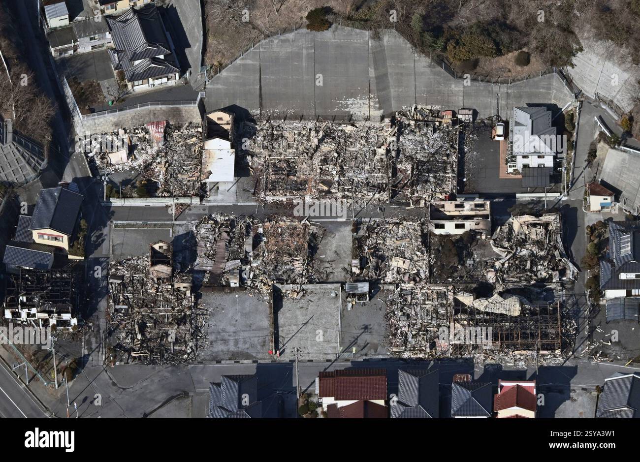 Aerial photo shows a village where many houses were burned down due to ...
