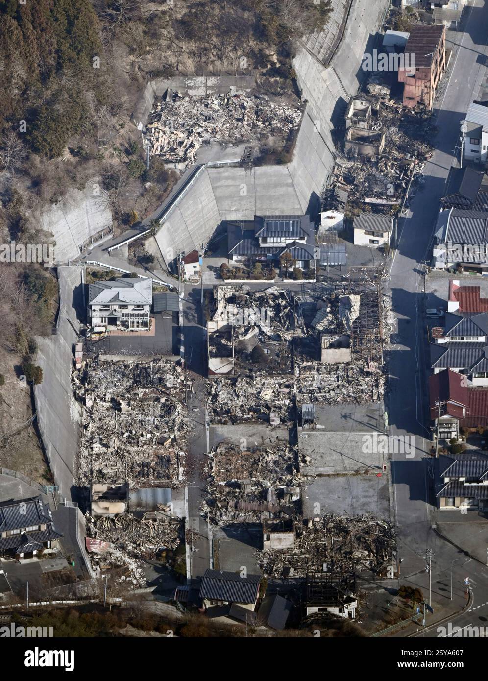 Aerial photo shows a village where many houses were burned down due to ...