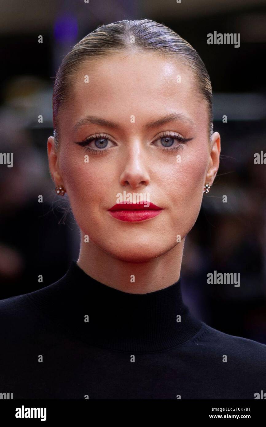 Madie PLT poses for photographers upon arrival for the premiere of the film 'Killers of the ...