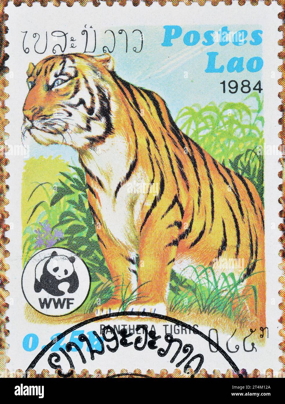 Timbre-poste annulé imprimé par le Laos, qui montre Tigre (Panthera ...