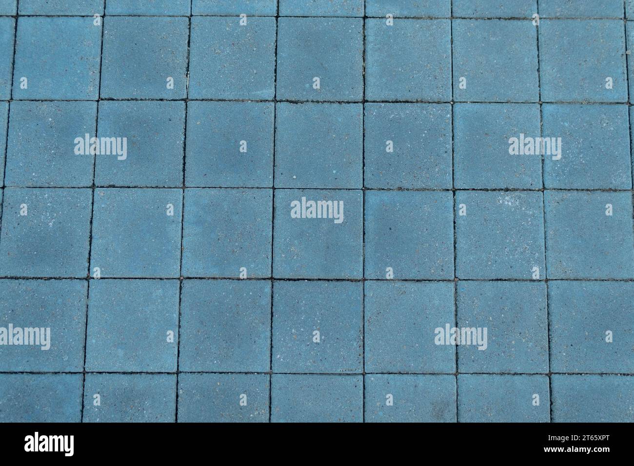 La texture de la tuile pavée au fond de la rue. Fond de sol en pierre ...