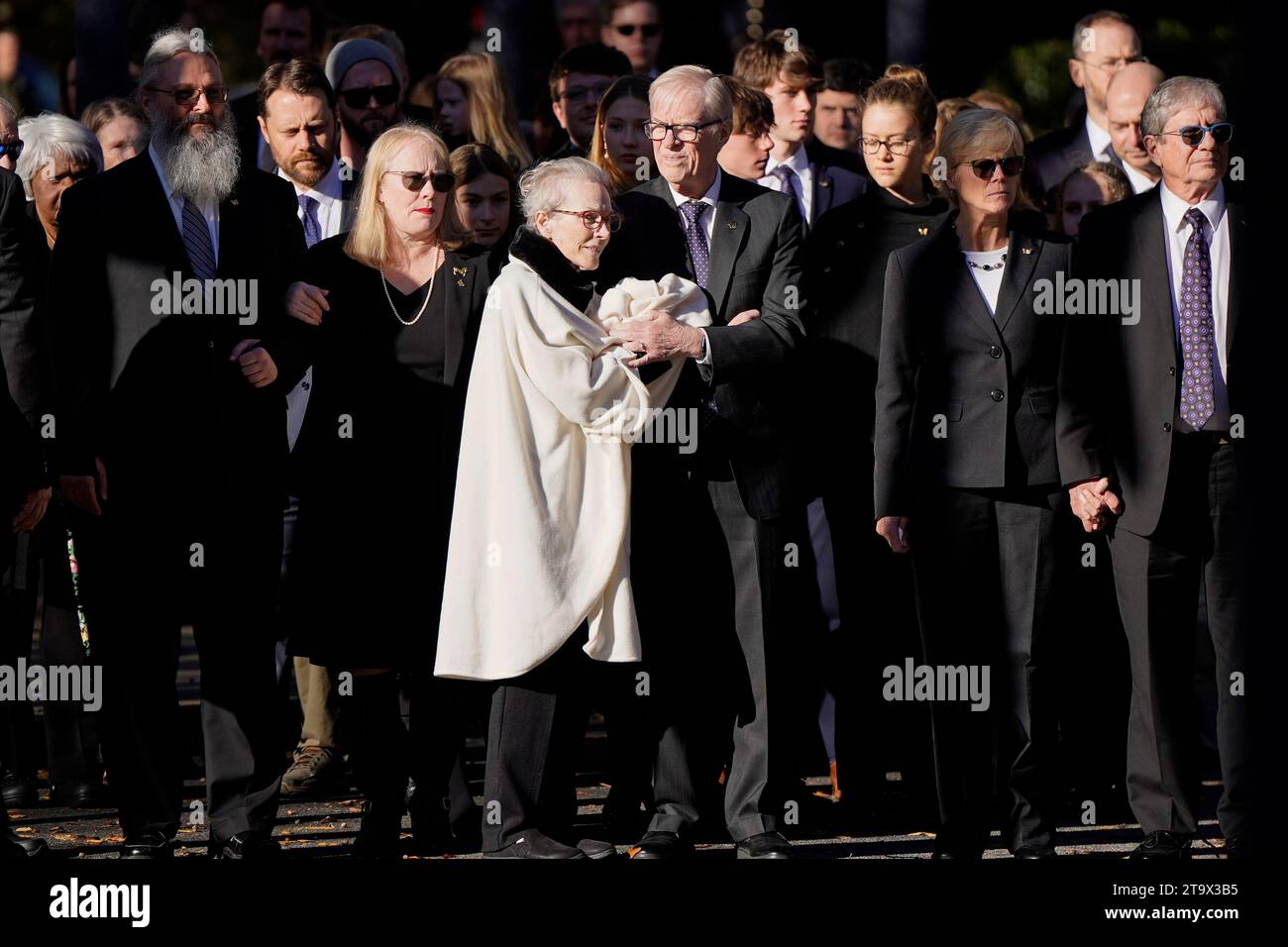 CORRECTS NAME OF AMY CARTER HUSBAND - Members of the Carter family watch as the casket of former ...