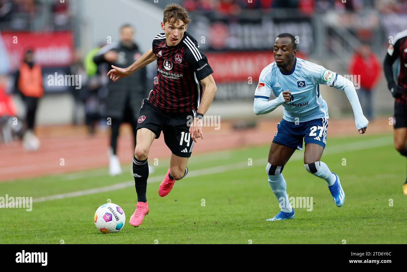 Bild : Benjamin Goller (1.FC Nuernberg, 14) et Jean-Luc Dompe (Hamburger SV, 27) (gauche-droite ...