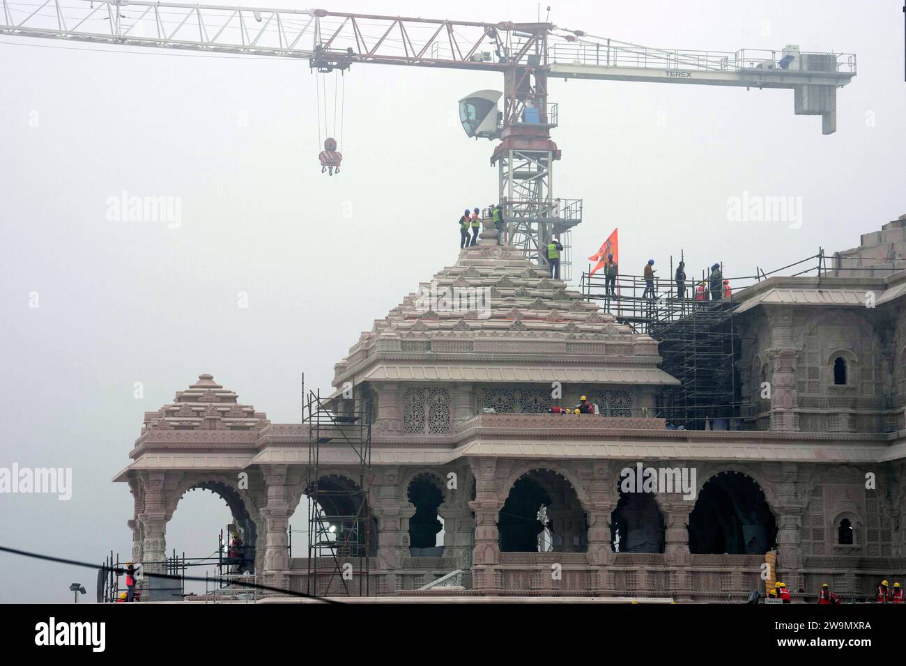 A construction crew works on Ram Mandir, a Hindu temple dedicated to ...