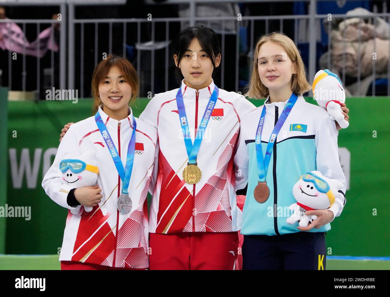 Silver medalist Yang Jingru, from left, gold medalist Li Jinzi of China and bronze medalist ...