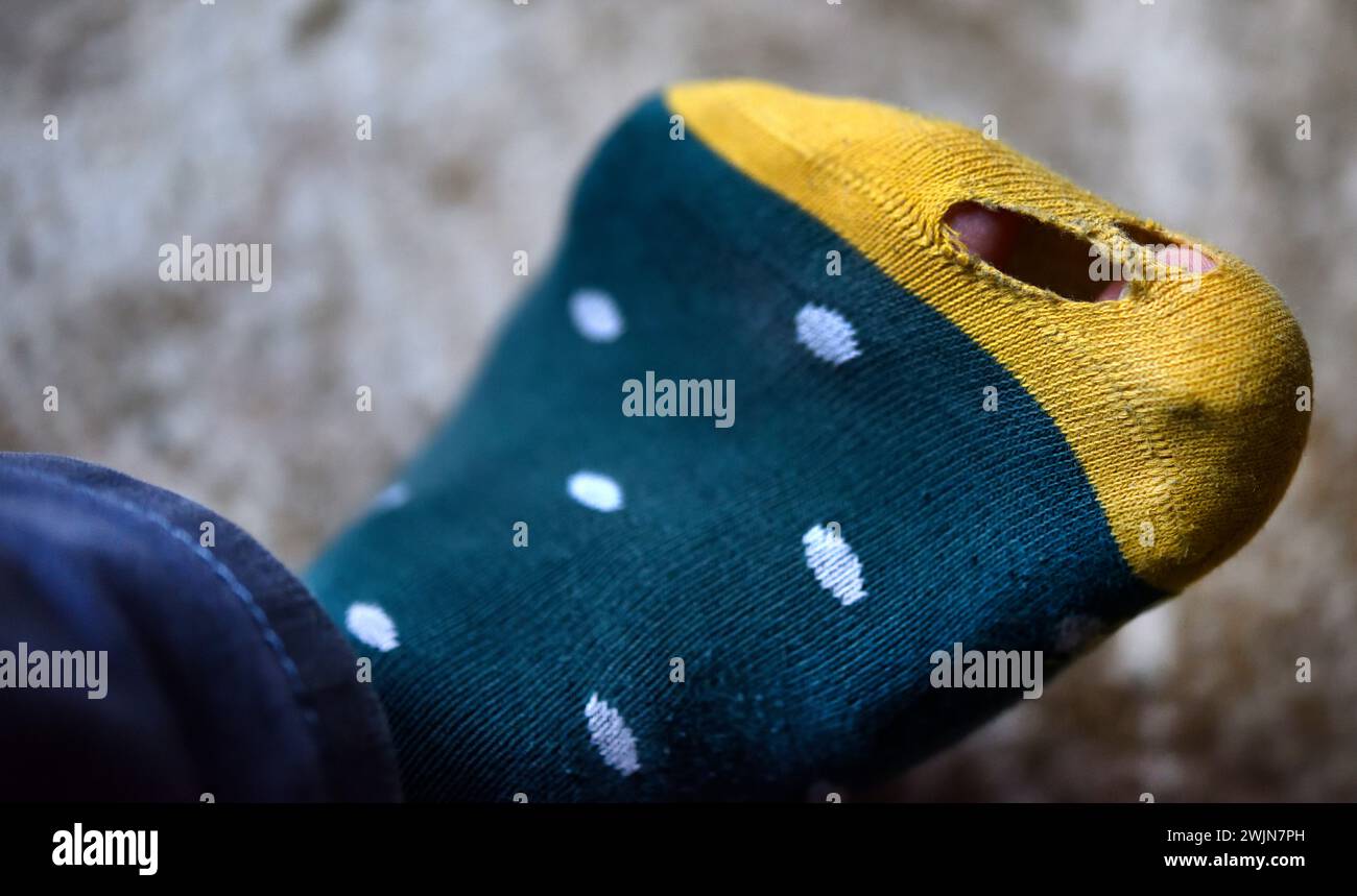 Holes in socks Banque de photographies et d’images à haute résolution ...