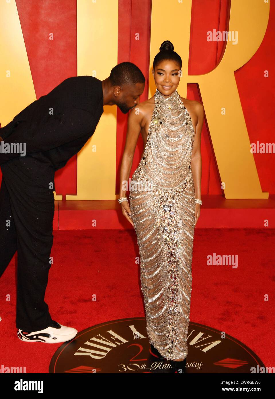 BEVERLY HILLS, CALIFORNIE - 10 MARS : (de gauche à droite) Dwyane Wade ...