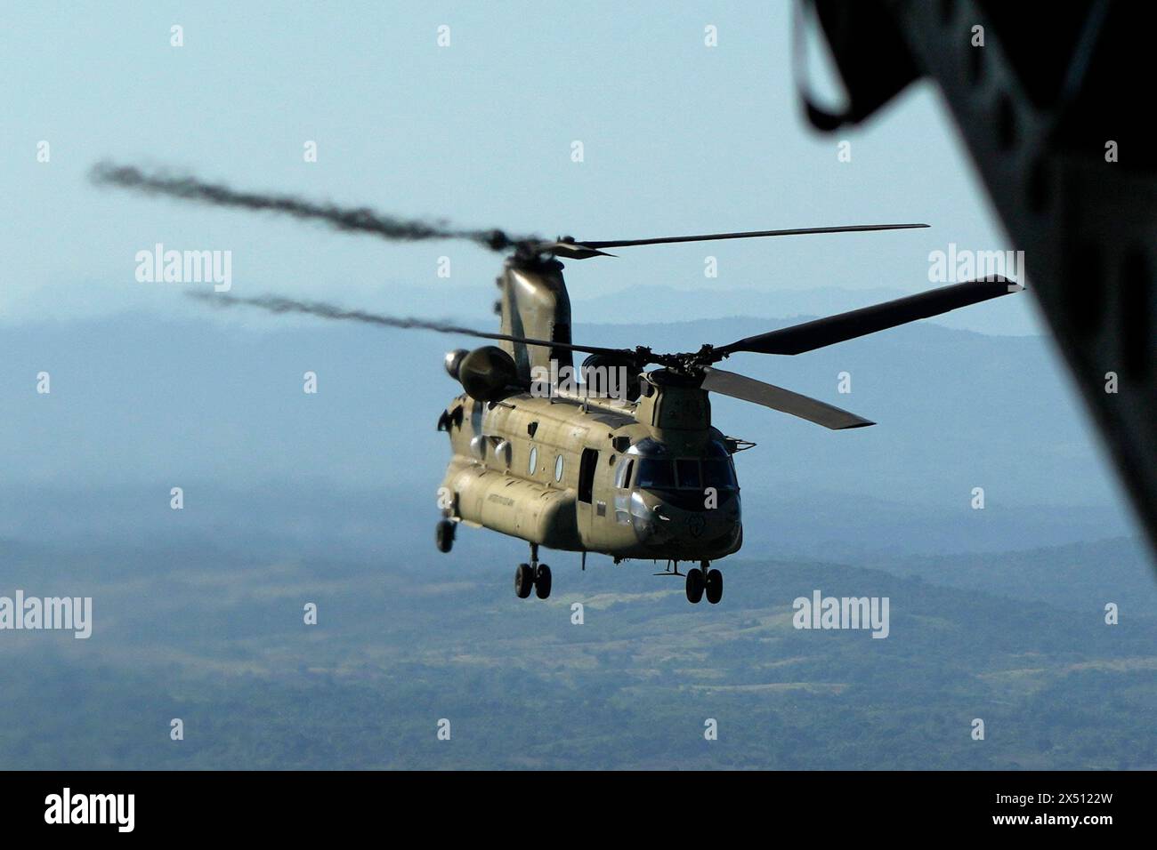 A U.S. Army CH-47 helicopter flies over Cagayan province, northern ...