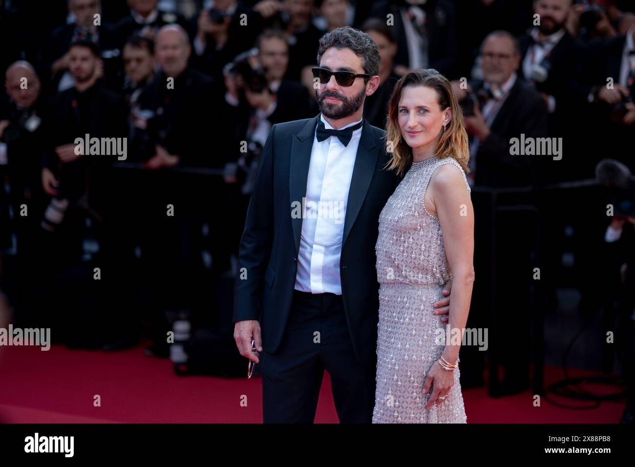 Cannes, France. 23 mai 2024. Benjamin Mahon et Camille Cottin assistent ...