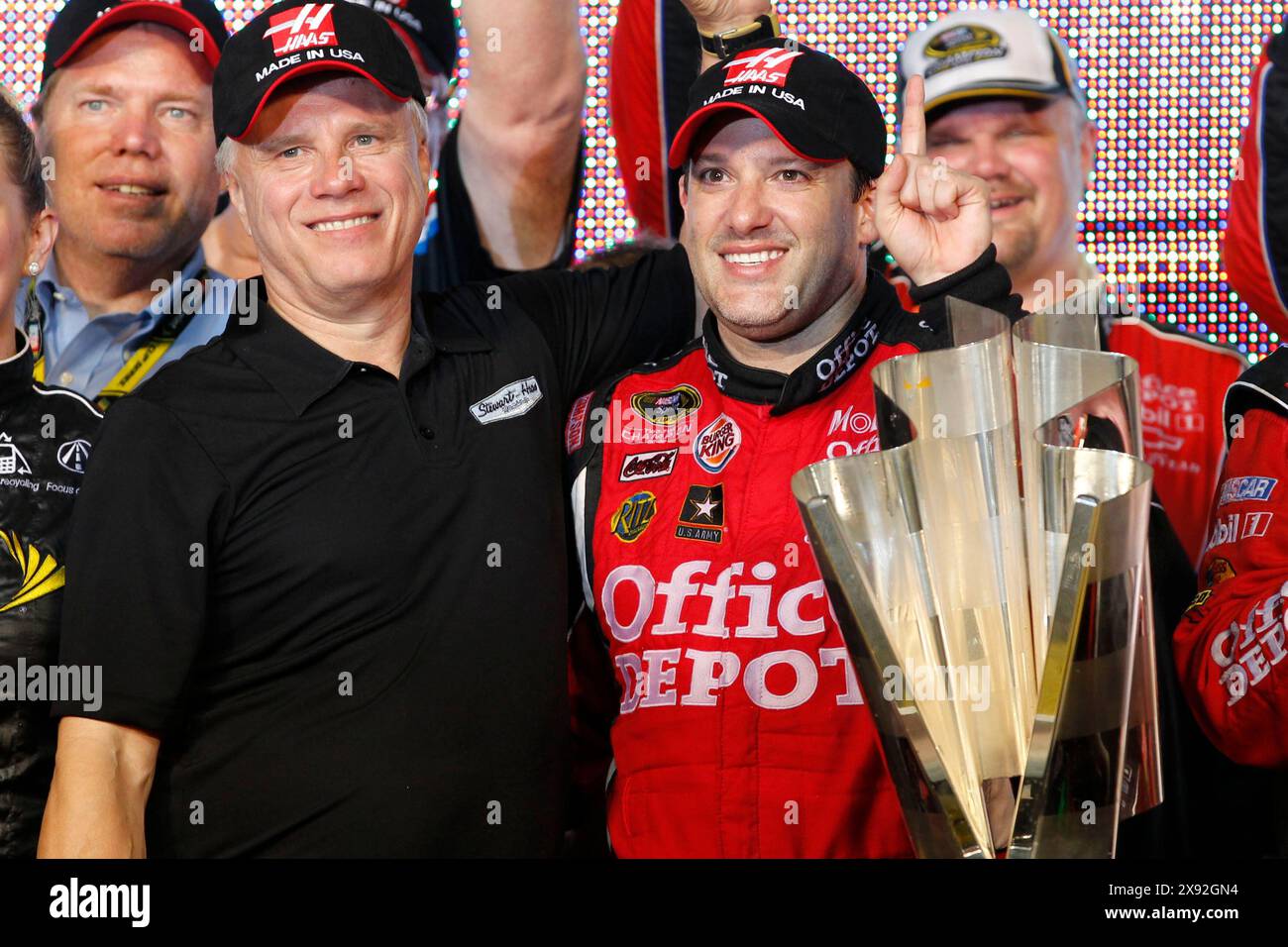 FILE - Team co-owner Carl Haas and Tony Stewart, right, pose with the ...