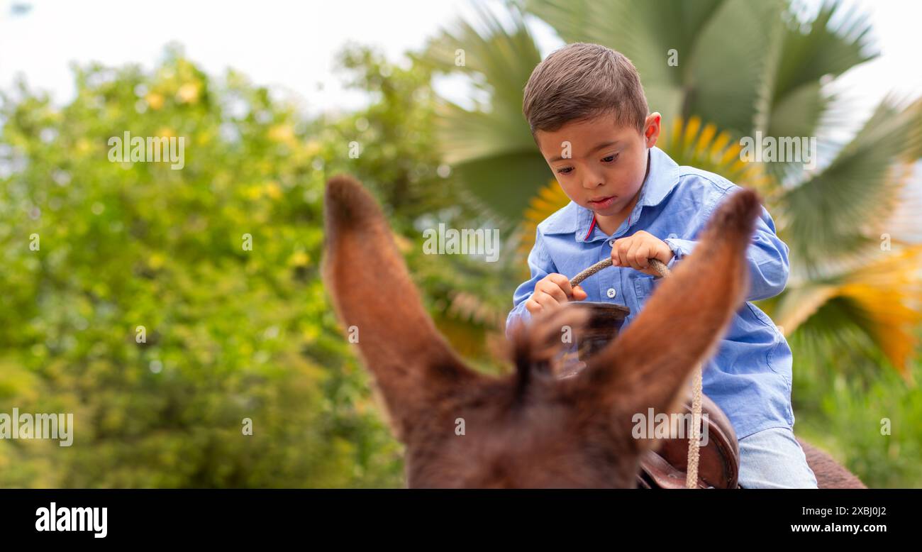 Enfant trisomique Banque de photographies et d’images à haute ...