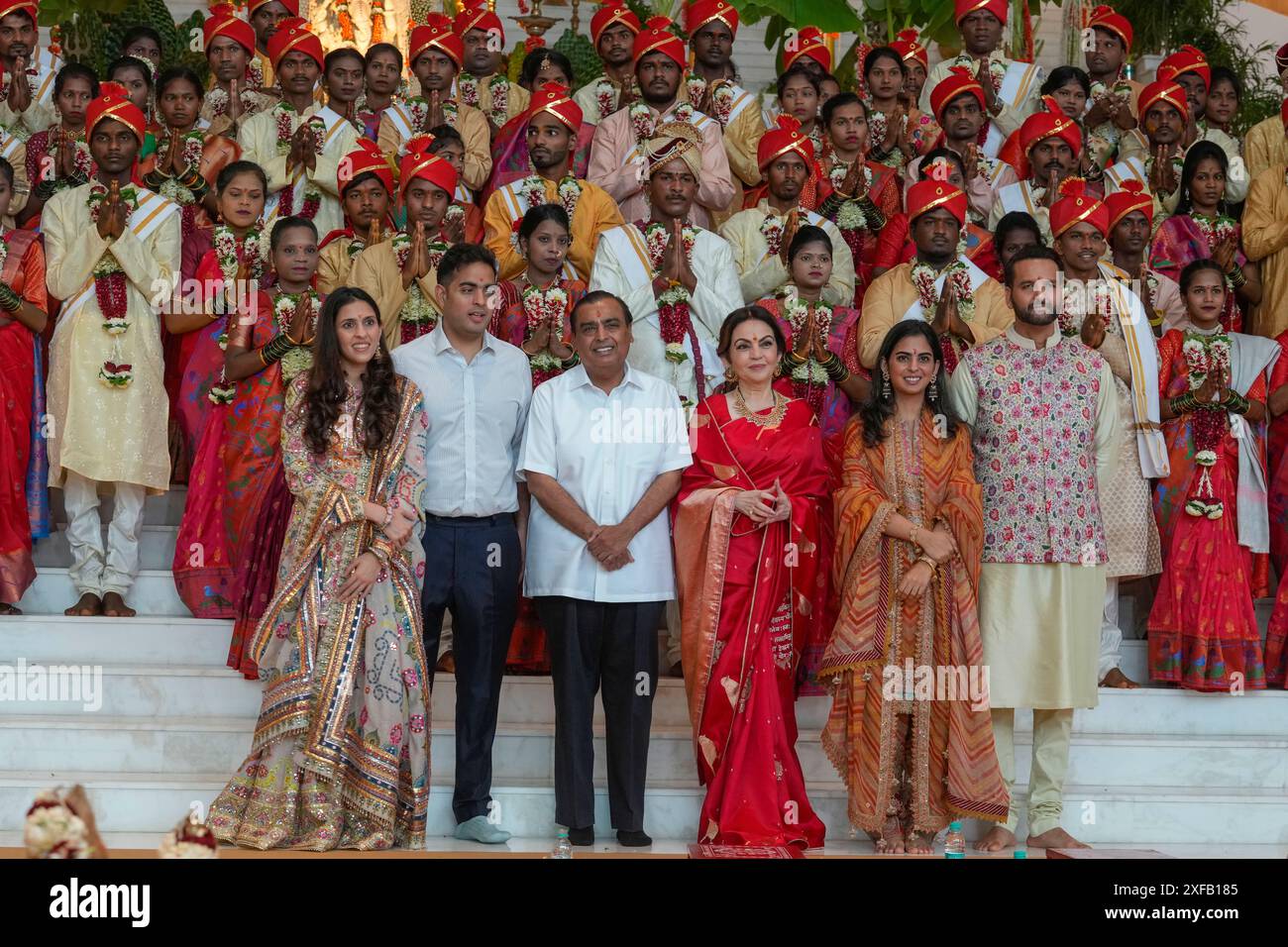 Chairman of Reliance Industries Limited Mukesh Ambani, third from left ...