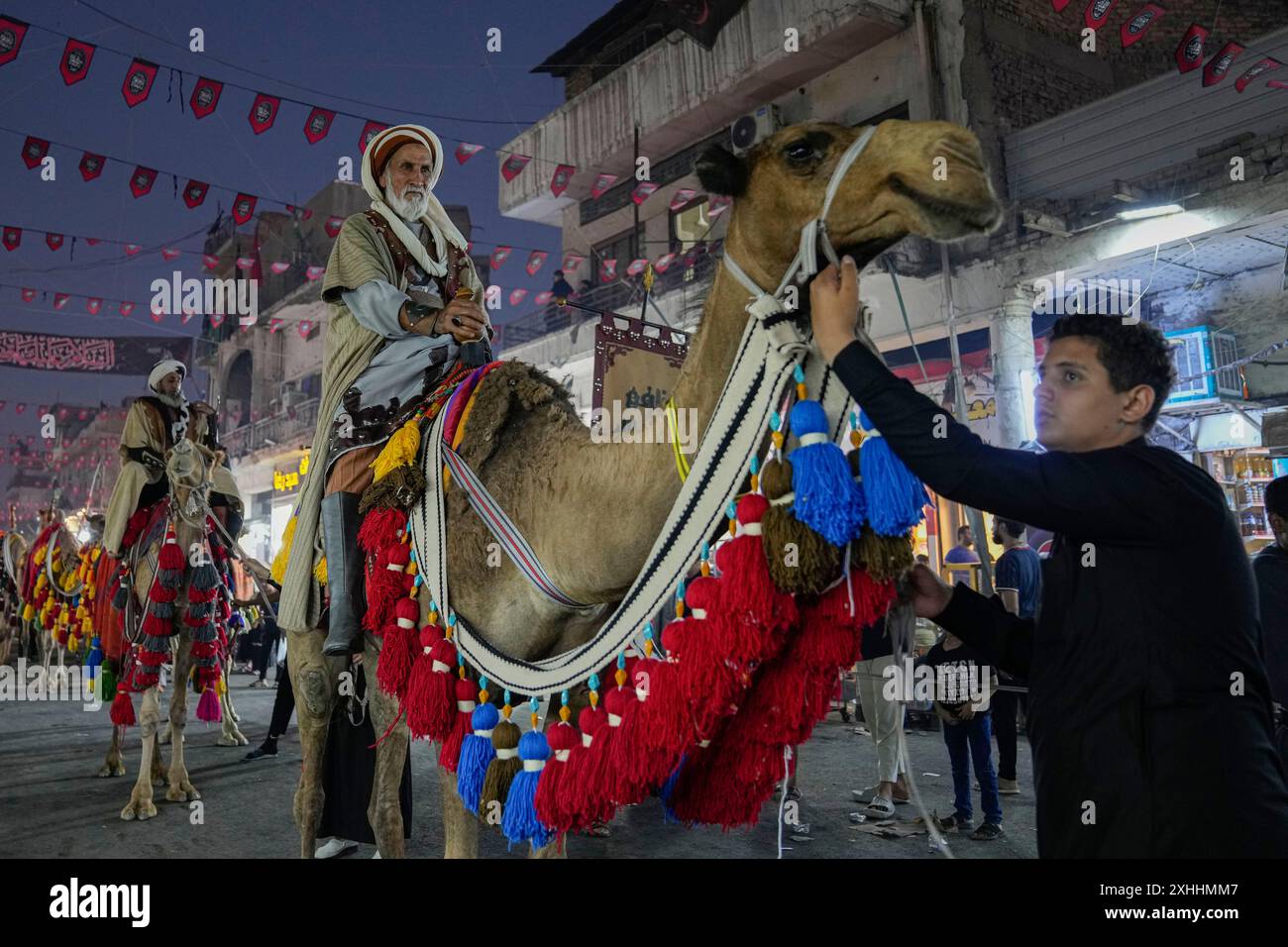 Iraqi Shiite wear traditional clothes to perform the epic of Imam ...