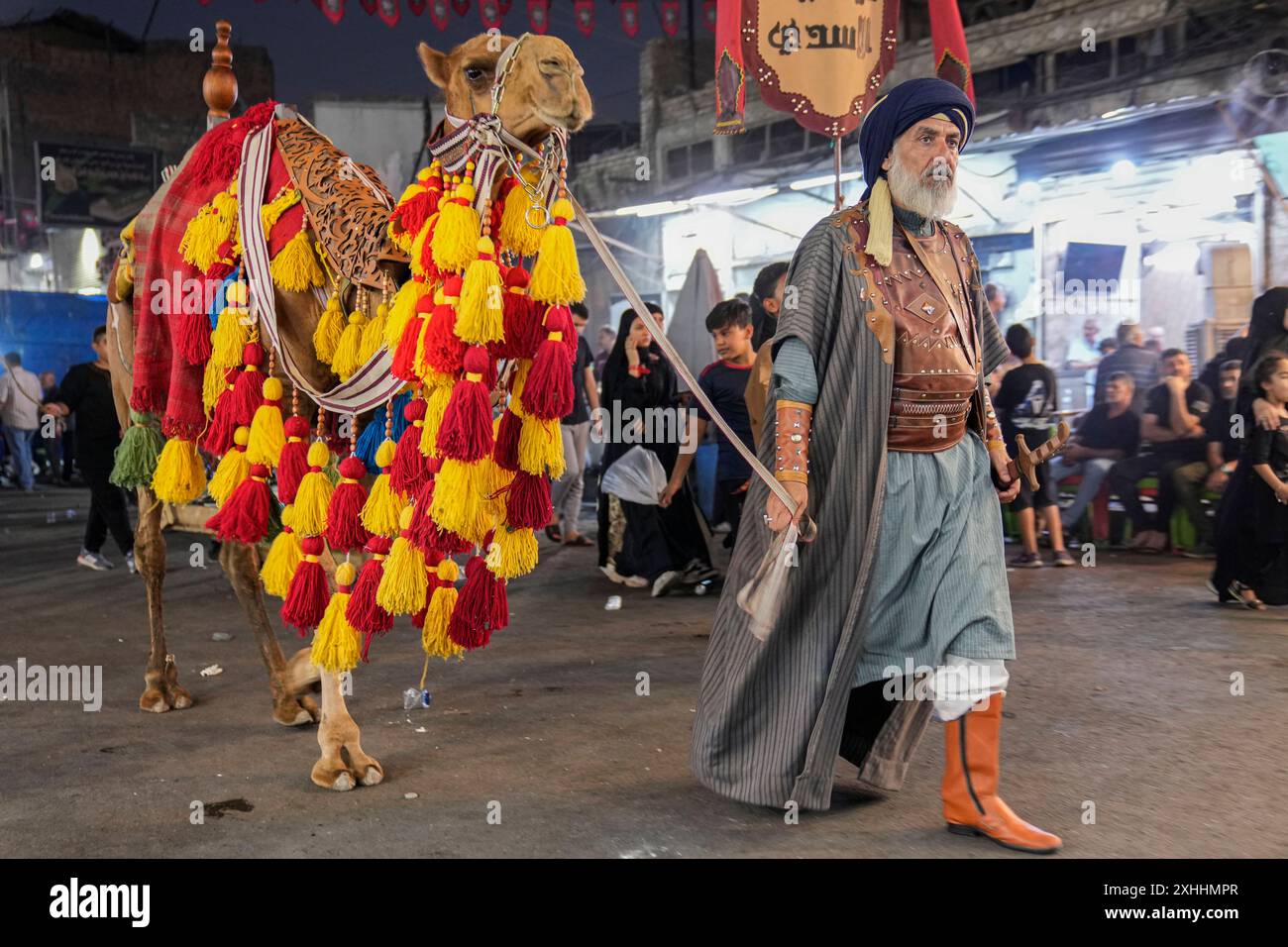 An Iraqi Shiite wear traditional clothes to perform the epic of Imam ...