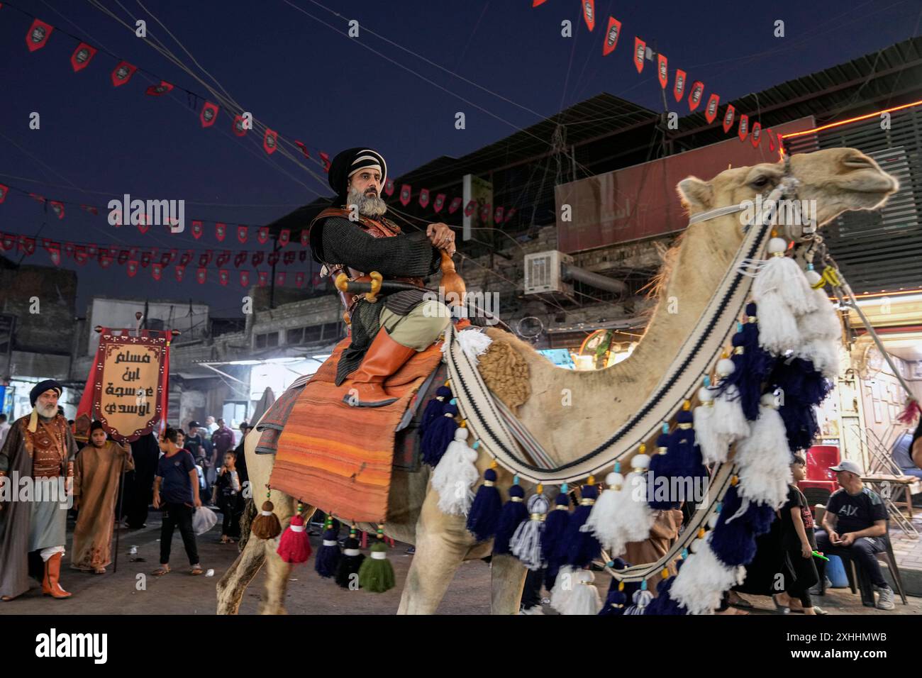 Iraqi Shiite wear traditional clothes to perform the epic of Imam ...